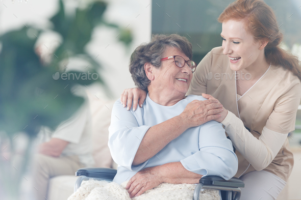 Patient and caregiver spend time together Stock Photo by bialasiewicz