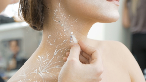 Professional Make-up Artist Draws Body Art on the Model. She Applies ...