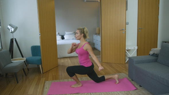 Woman Performing Lunges at Home, Stock Footage | VideoHive