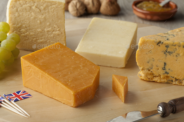 Pieces of traditional english cheese Stock Photo by picturepartners