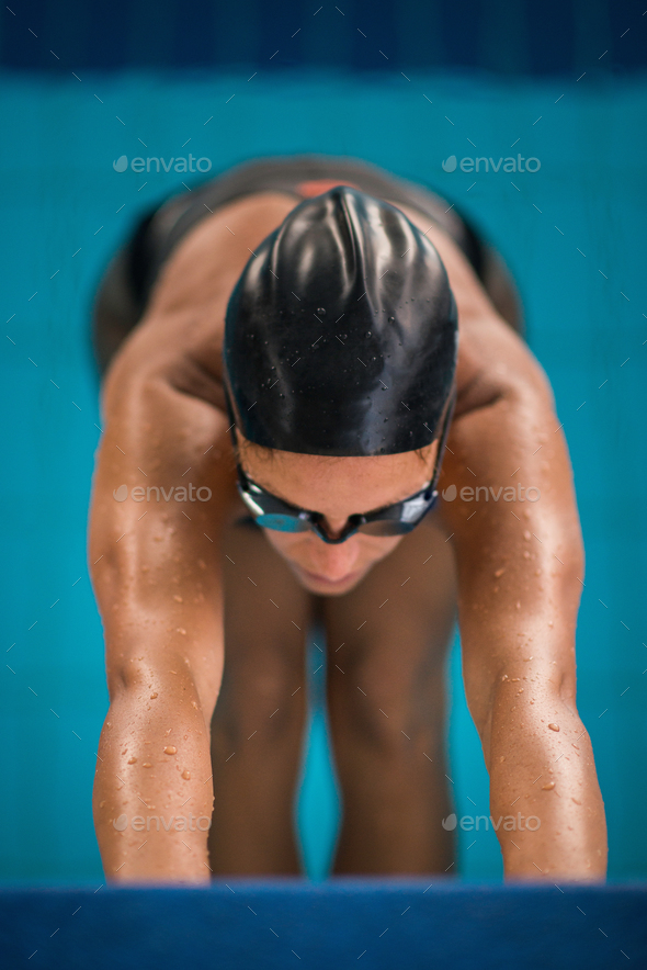 Professional swimmer in training, indoor swimming pool Stock Photo by ...