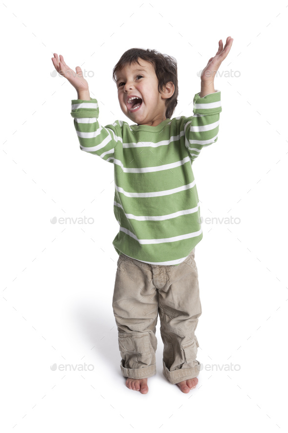 Happy singing two year old boy with his hands up Stock Photo by ...