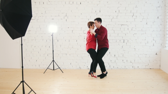 Two Professional Dancers - Female and Male Is Dancing Together in ...