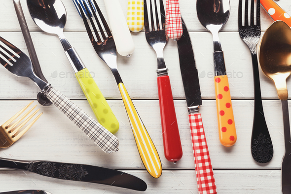 Collection of modern and antique cutlery, top view Stock Photo by ...