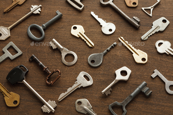 Many different keys on wood Stock Photo by Prostock-studio | PhotoDune