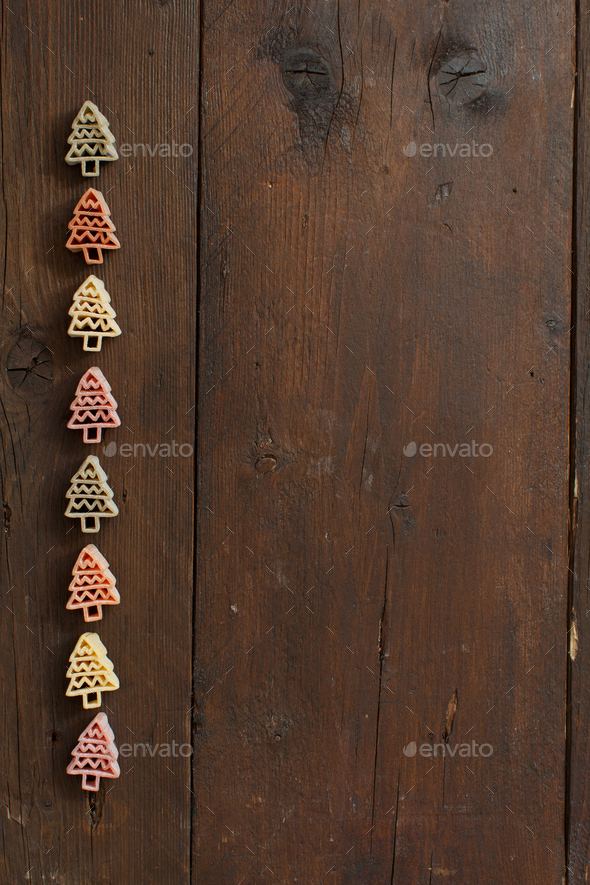 Tricolor fir tree shaped pasta background Stock Photo by katrinshine
