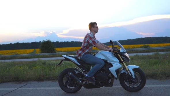 Young Man Riding on a Modern Sport Motorbike, Stock Footage | VideoHive