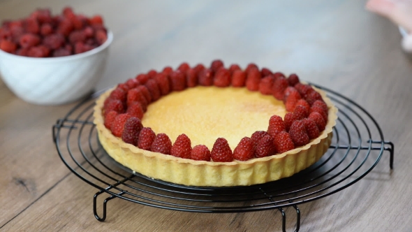 Putting Raspberries on Tart Pan, Stock Footage | VideoHive