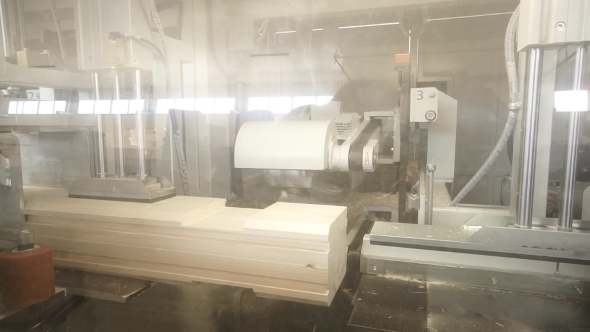 Woodworking Machine Processing Wood and Timber at the Milling Beam ...