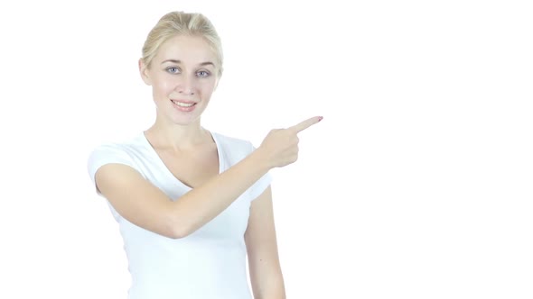 Woman Pointing Showing Direction Aside , White Background, Stock Footage