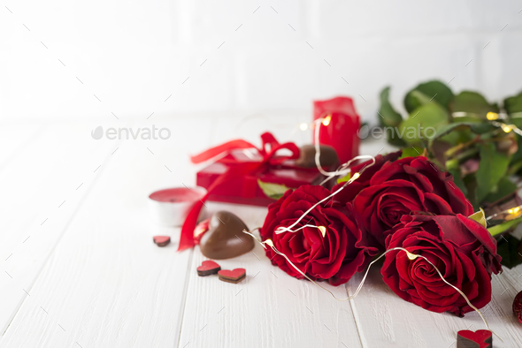 red roses and chocolate candies for Valentine's Day Stock Photo by ...
