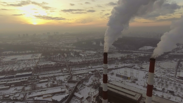 Aerial View of a Tube with Smoke at Winter Sunset, Stock Footage ...