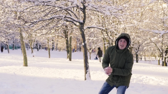 Young Man Getting Snowball on Body and Head, Stock Footage | VideoHive