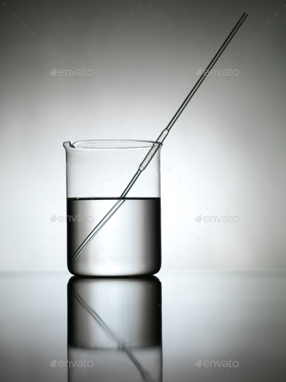 beaker with dropper and transparent liquid substance Stock Photo by ...