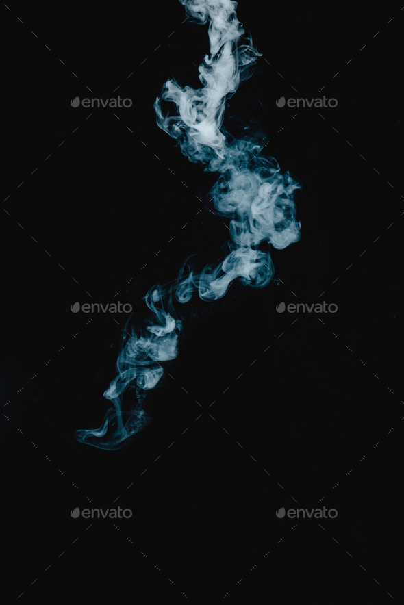 Vapor texture from a hot drink on a black background. Blue smoke with ...