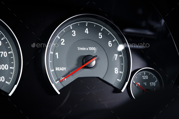 Close up shot of a speedometer in a car. Stock Photo by gargantiopa