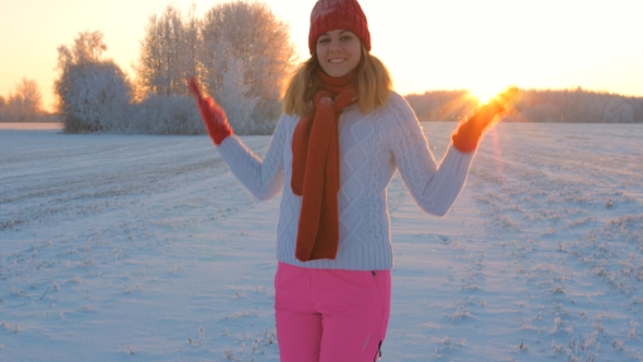 Cheerful Woman Dancing Winter Outdoor Jumping on the Snow and Hands up ...