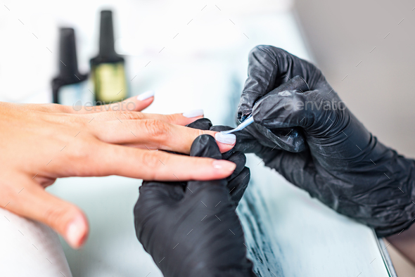 Manicuring nails Stock Photo by microgen | PhotoDune