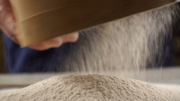 Sifting Whole-grain Flour Through a Sieve . Video, Stock Footage ...