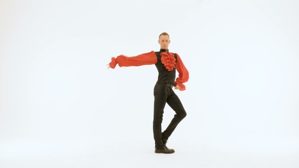 The Ballet Actor in a Black Suit and Red Shirt Beautifully Dances on a ...