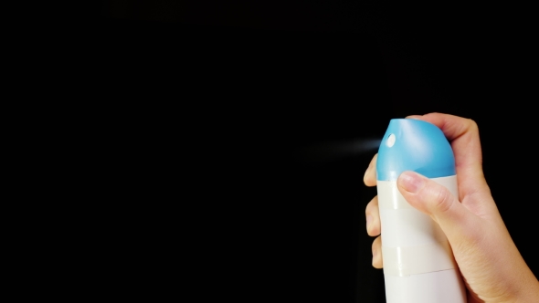 Spray From a Spray Can with a Spray on a Black Background, Stock Footage