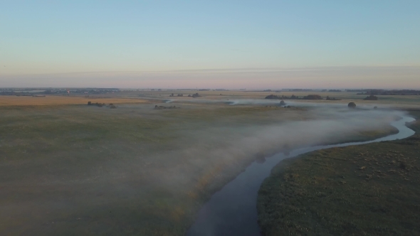 Aerial View of the Fog Over the River at Dawn, Stock Footage | VideoHive