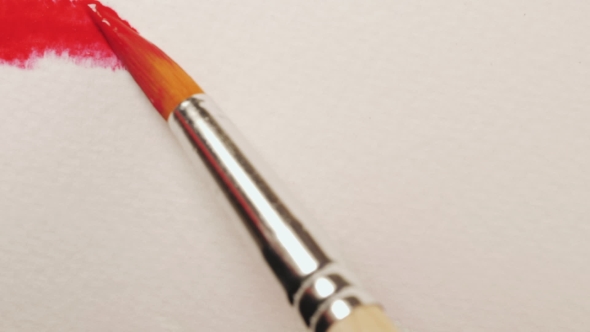 Paintbrush Moves Across Canvas Leaving Red Brush Strokes of Paint ...