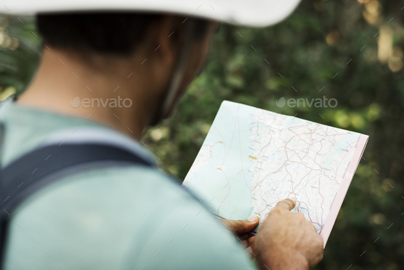 Man finding direction using a map Stock Photo by Rawpixel | PhotoDune