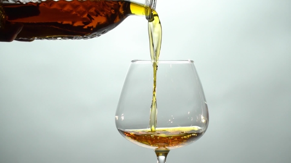 Pouring Cognac from a Decanter into a Glass , Stock Footage | VideoHive