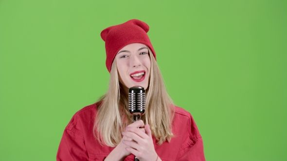 Singer Performs Lyrical Songs in a Retro Microphone. Green Screen ...