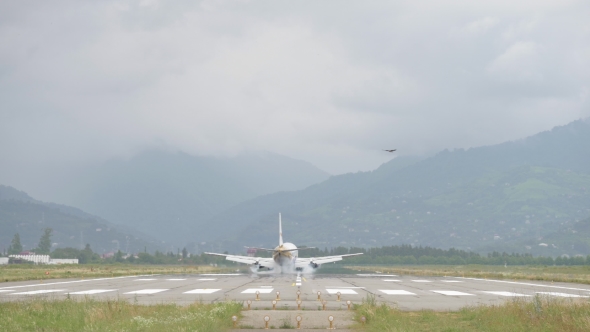 Airplane Landing To the Airport in Mountains - Georgia, Stock Footage