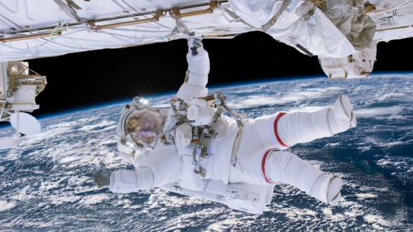 Astronaut Working on Space Station Above the Earth, Motion Graphics