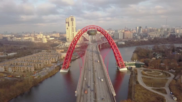Metal Construction of Red Arch Cable Stayed Picturesque Bridge Over ...