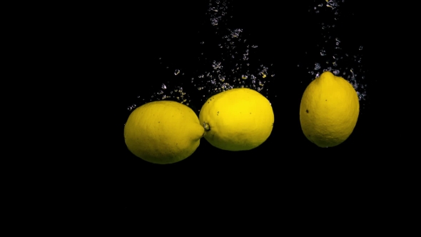 Falling Lemons Into the Water in, Stock Footage | VideoHive