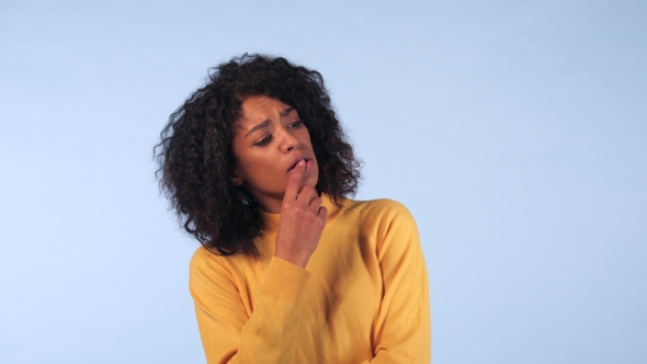 Thinking Woman Looking Up and Around at Copyspace. Neutral ...