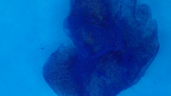 Blue Ink Reacting in Water Creating Abstract Background., Stock Footage