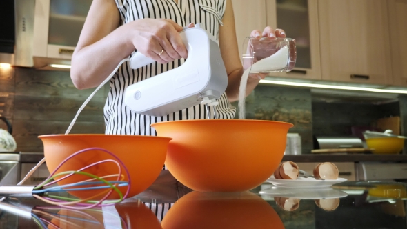Woman Hand Pouring Sugar Into bowl.Mixing Ingredients for Cooking Cake ...