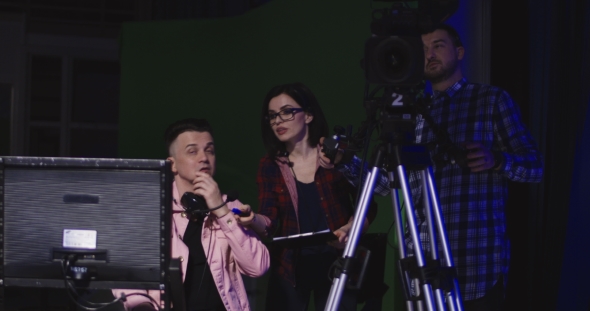 Production Team Having a Discussion, Stock Footage | VideoHive