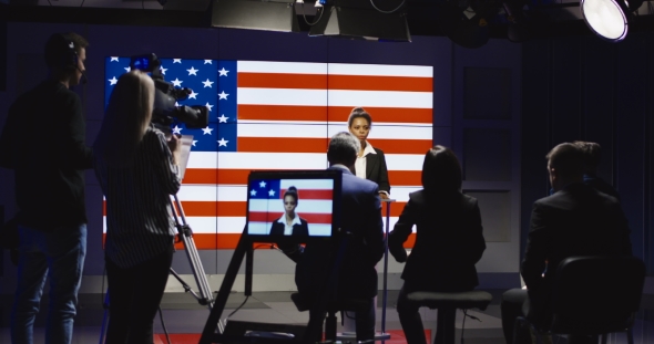 Production Team Filming a Show Host in a Studio, Stock Footage | VideoHive