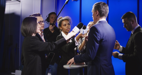 Businessman Cutting Off Interview with Reporters, Stock Footage | VideoHive