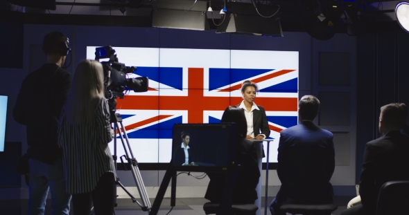Production Team Assisting a News Anchor, Stock Footage | VideoHive
