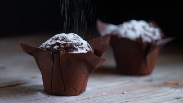Muffin Cake with White Powdered Sugar. Seamless Cinemagraph Video ...
