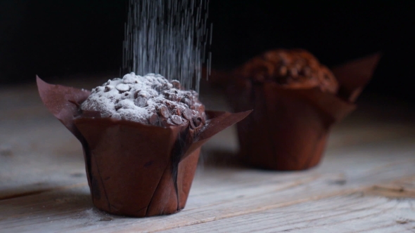 Muffin Cake with White Powdered Sugar. Seamless Cinemagraph Video ...