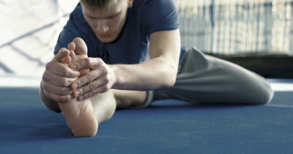 Sportsman Stretching in Gym, Stock Footage | VideoHive