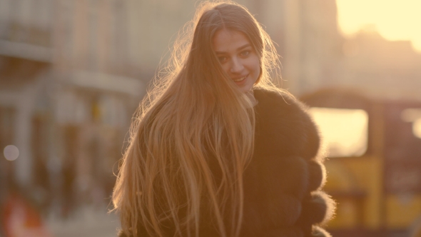 Attractive Young Lady Is Rushing in the City-center, She Turns To ...