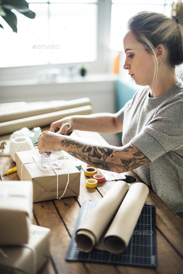 Woman packing parcel box Stock Photo by Rawpixel | PhotoDune