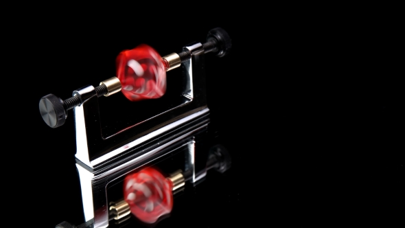 Rotation of the Red Dice on a Special Device Balancer To Check the ...