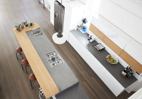 Overhead View Of Modern Kitchen With Island Stock Photo by monkeybusiness