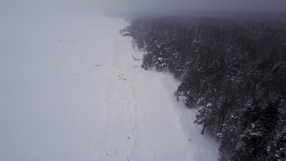 Flying Over the Winter Sea with Snow, Stock Footage | VideoHive