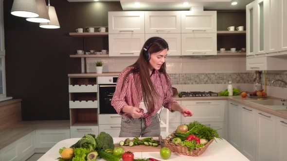 Girl Singing As Cooking, Stock Footage | VideoHive